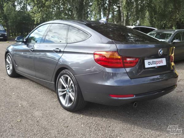 Black BMW 320 Gran Turismo 2015 in Vilnius, with an engine capacity of 2.00 L and mileage of 217 thousand km for 10999 €, photo 5 on AUTOMOTO.COM.LV