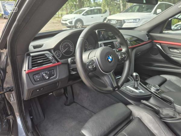 Black BMW 320 Gran Turismo 2015 in Vilnius, with an engine capacity of 2.00 L and mileage of 217 thousand km for 10999 €, photo 9 on AUTOMOTO.COM.LV