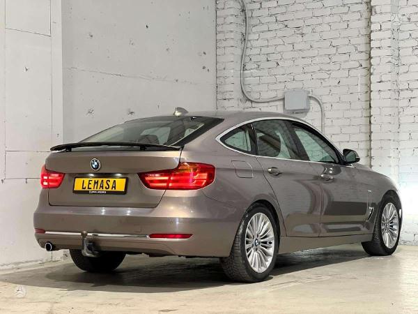 Brown BMW 320 Gran Turismo 2013 in Klaipeda, with an engine capacity of 2.00 L and mileage of 338 thousand km for 10499 €, photo 5 on AUTOMOTO.COM.LV