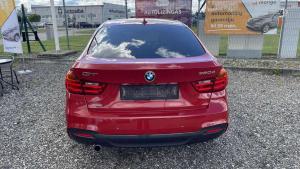 Red BMW 320 Gran Turismo 2014 in Marijampole, with an engine capacity of 2.00 L and mileage of 303 thousand km for 11990 €, photo 13 on AUTOMOTO.COM.LV