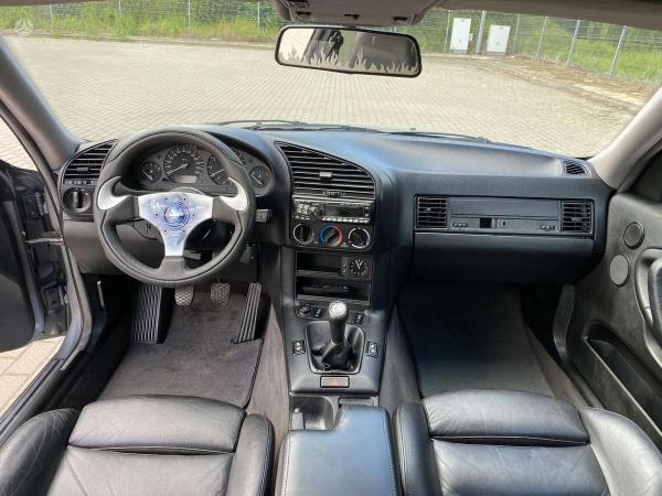 Grey BMW 320 1992 in Marijampole, with an engine capacity of 2.00 L and mileage of 199 thousand km for 7950 €, photo 10 on AUTOMOTO.COM.LV