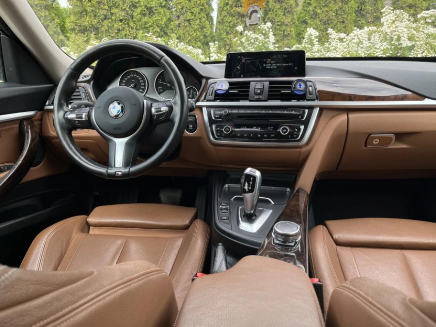 Grey BMW 320 2015 in Riga, with an engine capacity of 2.00 L and mileage of 218 thousand km for 12990 €, photo 6 on AUTOMOTO.COM.LV