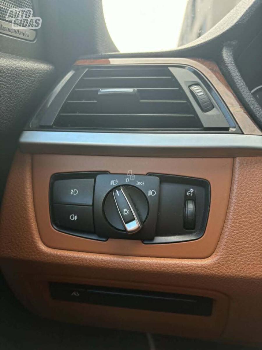 Grey BMW 320 2012 in Kaunas, with an engine capacity of 2.00 L and mileage of 291 thousand km for 9900 €, photo 14 on AUTOMOTO.COM.LV