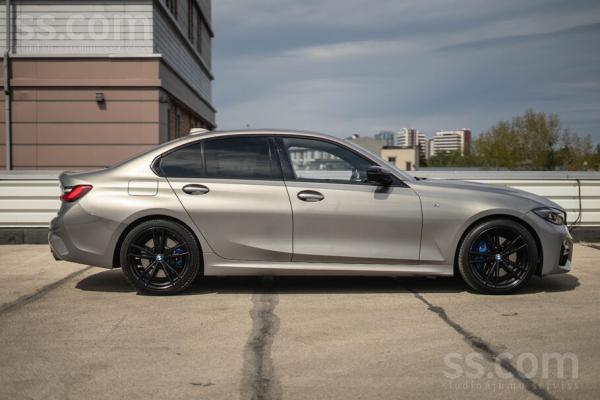 Grey BMW 320 2021 in Riga, with an engine capacity of 2.00 L and mileage of 218 thousand km for 23990 €, photo 7 on AUTOMOTO.COM.LV
