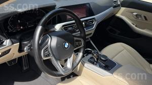 Grey BMW 320 2021 in Riga, with an engine capacity of 2.00 L and mileage of 208 thousand km for 20000 €, photo 8 on AUTOMOTO.COM.LV