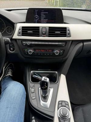 Grey BMW 320 2012 in Kaunas, with an engine capacity of 2.00 L and mileage of 265 thousand km for 5150 €, photo 13 on AUTOMOTO.COM.LV