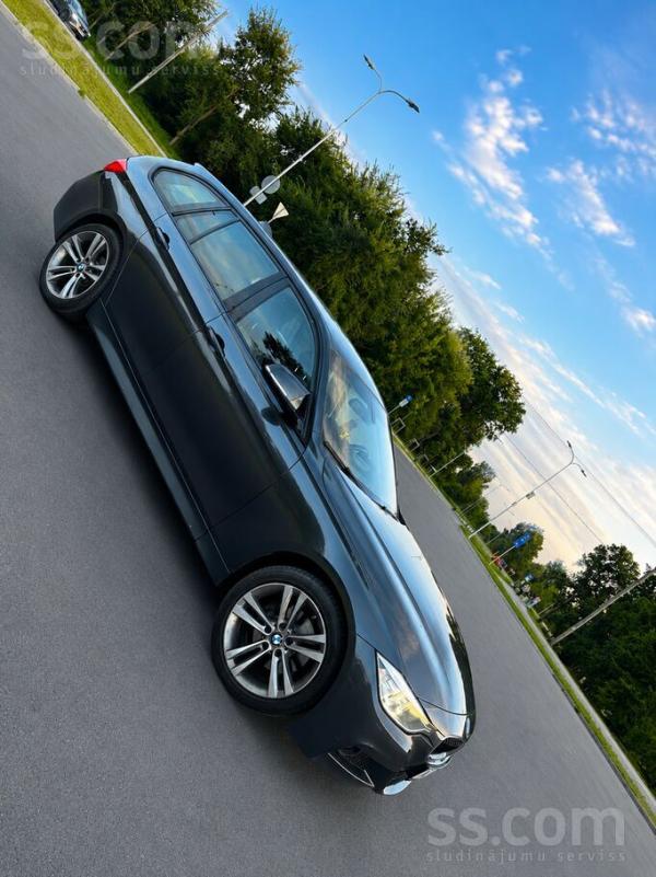 Grey BMW 320 2013 in Riga, with an engine capacity of 2.00 L and mileage of 302 thousand km for 11999 €, photo 3 on AUTOMOTO.COM.LV