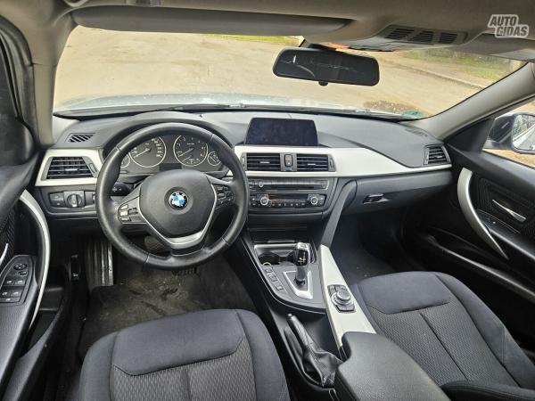 Grey BMW 320 2013 in Sakiai, with an engine capacity of 2.00 L and mileage of 240 thousand km for 5999 €, photo 11 on AUTOMOTO.COM.LV