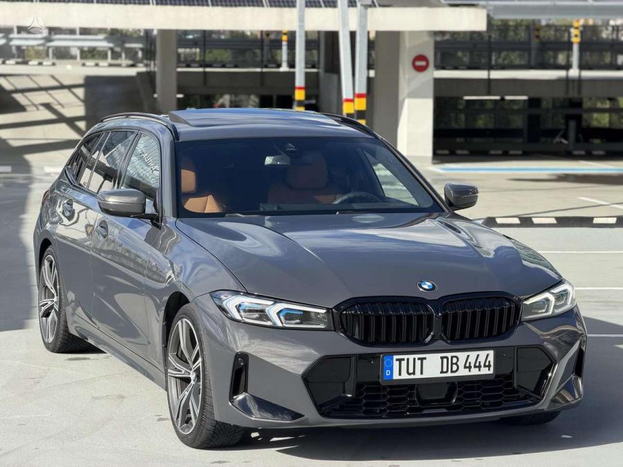 Grey BMW 320 2023 in Vilnius, with an engine capacity of 2.00 L and mileage of 112 thousand km for 29999 €, photo 3 on AUTOMOTO.COM.LV