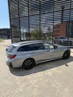 Grey BMW 320 2023 in Klaipeda, with an engine capacity of 2.00 L and mileage of 68 thousand km for 28700 €, photo 6 on AUTOMOTO.COM.LV