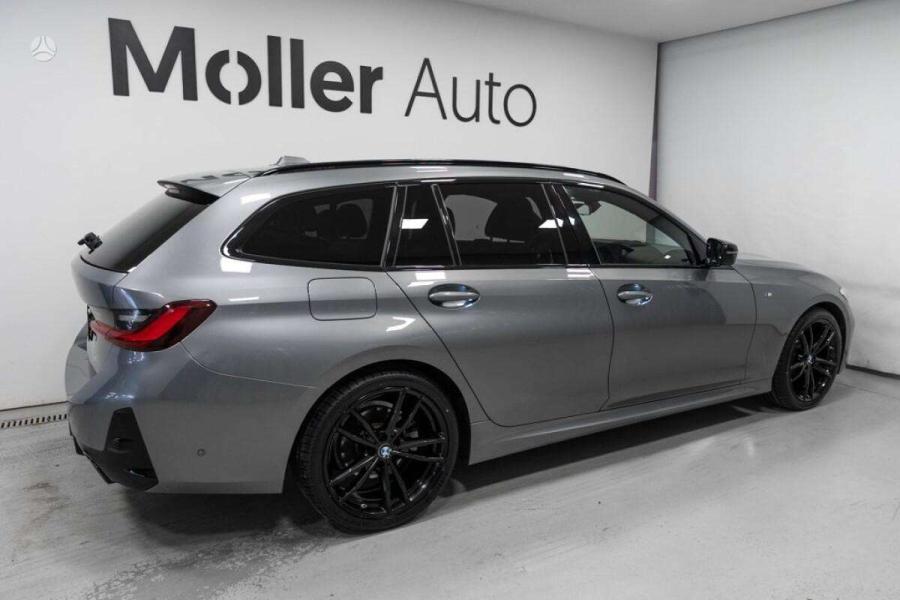 Grey BMW 320 2024 in Vilnius, with an engine capacity of 2.00 L and mileage of 76 thousand km for 38900 €, photo 5 on AUTOMOTO.COM.LV