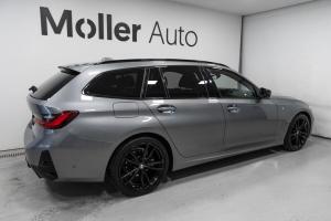 Grey BMW 320 2024 in Vilnius, with an engine capacity of 2.00 L and mileage of 76 thousand km for 38900 €, photo 5 on AUTOMOTO.COM.LV