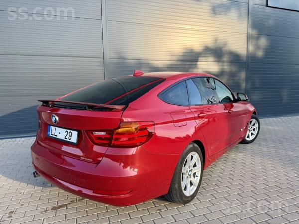Red BMW 320 2014 in Jelgava, with an engine capacity of 2.00 L and mileage of 315 thousand km for 12100 €, photo 4 on AUTOMOTO.COM.LV