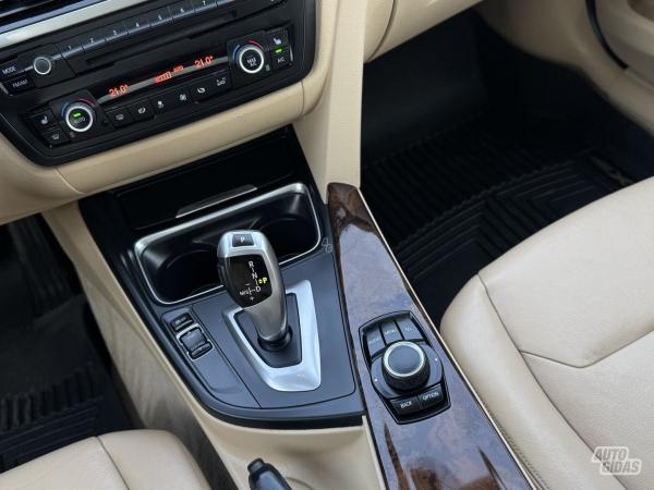 Red BMW 320 2014 in Vilnius, with an engine capacity of 2.00 L and mileage of 131 thousand km for 10900 €, photo 8 on AUTOMOTO.COM.LV