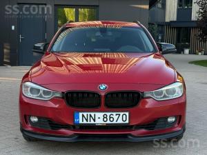 Red BMW 320 2013 in Riga, with an engine capacity of 2.00 L and mileage of 297 thousand km for 6990 €, photo 12 on AUTOMOTO.COM.LV