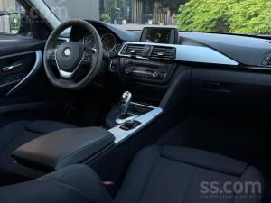 Red BMW 320 2013 in Riga, with an engine capacity of 2.00 L and mileage of 297 thousand km for 6990 €, photo 14 on AUTOMOTO.COM.LV