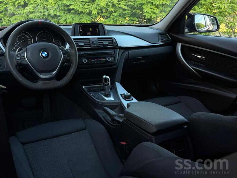 Red BMW 320 2013 in Riga, with an engine capacity of 2.00 L and mileage of 297 thousand km for 6990 €, photo 15 on AUTOMOTO.COM.LV