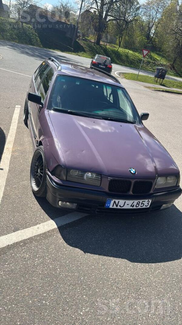 Violet BMW 320 1996 in Riga, with an engine capacity of 2.00 L and mileage of 293 thousand km for 2200 €, photo 2 on AUTOMOTO.COM.LV