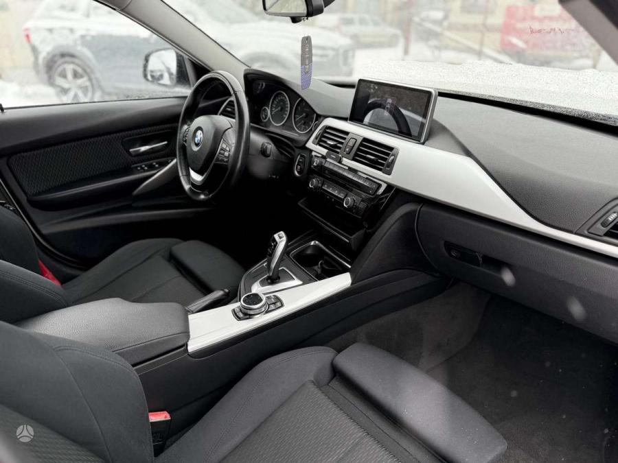 White BMW 320 2012 in Ukmerge, with an engine capacity of 2.00 L and mileage of 260 thousand km for 8199 €, photo 8 on AUTOMOTO.COM.LV