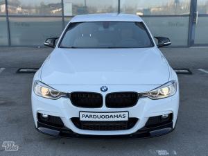 White BMW 320 2012 in Panevezys, with an engine capacity of 2.00 L and mileage of 297 thousand km for 11111 €, photo 3 on AUTOMOTO.COM.LV