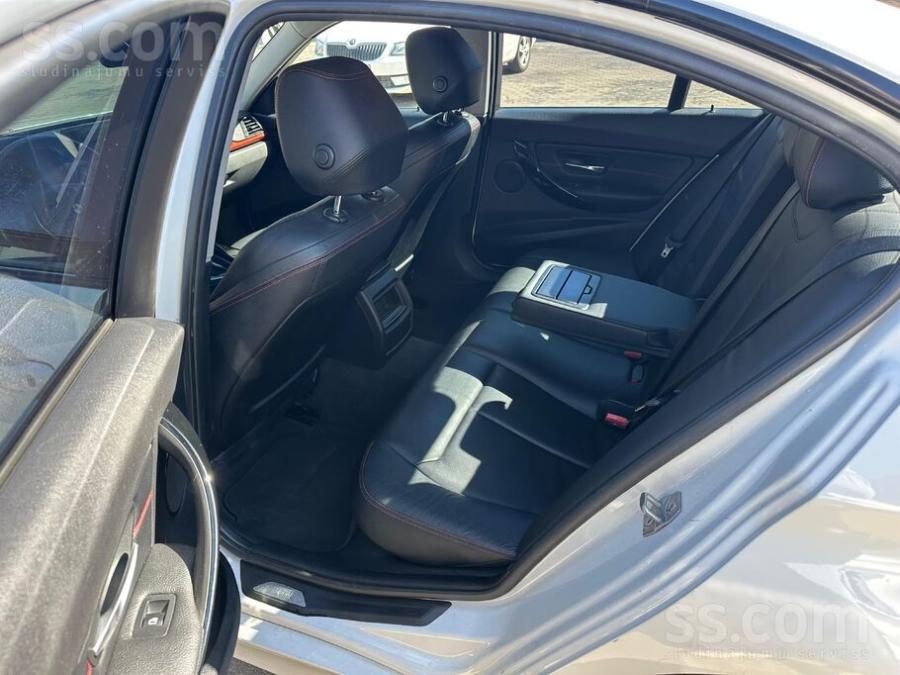 White BMW 320 2013 in Riga, with an engine capacity of 2.00 L and mileage of 300 thousand km for 10200 €, photo 8 on AUTOMOTO.COM.LV