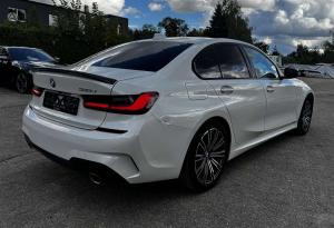 White BMW 320 2020 in Panevezys, with an engine capacity of 2.00 L and mileage of 288 thousand km for 16900 €, photo 5 on AUTOMOTO.COM.LV