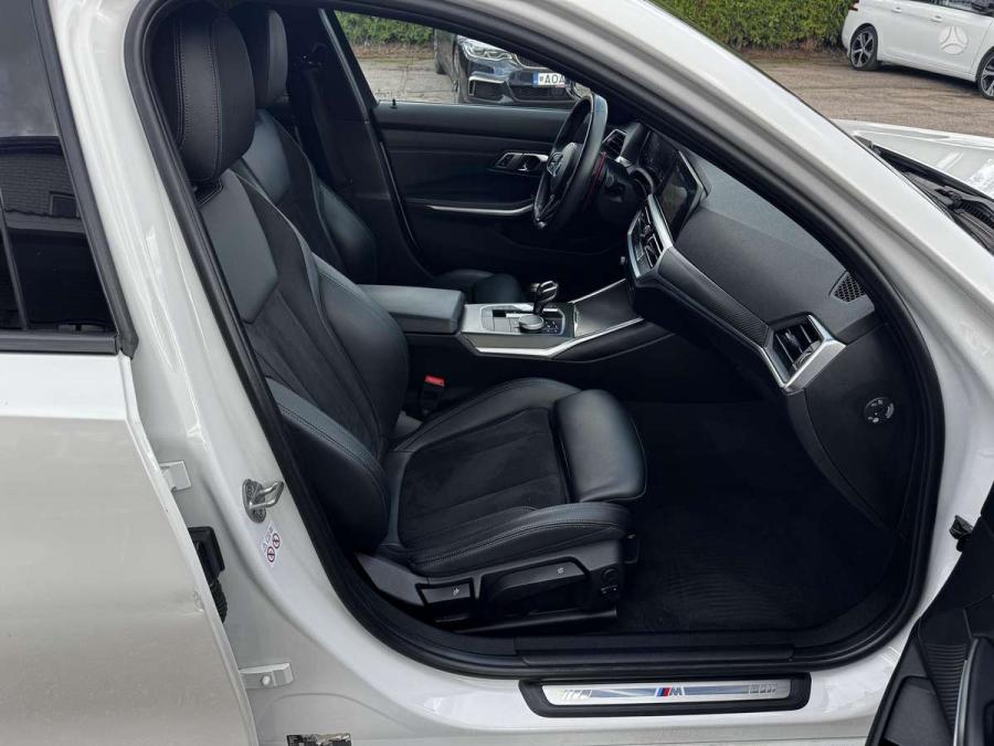 White BMW 320 2020 in Panevezys, with an engine capacity of 2.00 L and mileage of 288 thousand km for 16900 €, photo 11 on AUTOMOTO.COM.LV