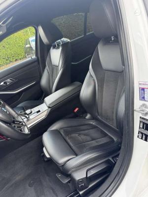 White BMW 320 2020 in Panevezys, with an engine capacity of 2.00 L and mileage of 288 thousand km for 16900 €, photo 12 on AUTOMOTO.COM.LV