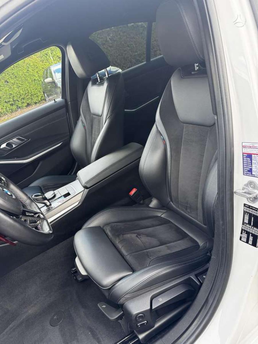 White BMW 320 2020 in Panevezys, with an engine capacity of 2.00 L and mileage of 288 thousand km for 16900 €, photo 12 on AUTOMOTO.COM.LV