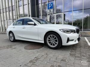 White BMW 320 2020 in Vilnius, with an engine capacity of 2.00 L and mileage of 420 thousand km for 16990 €, photo 4 on AUTOMOTO.COM.LV