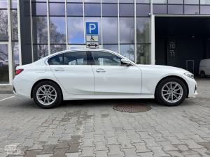 White BMW 320 2020 in Vilnius, with an engine capacity of 2.00 L and mileage of 420 thousand km for 16990 €, photo 5 on AUTOMOTO.COM.LV