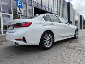 White BMW 320 2020 in Vilnius, with an engine capacity of 2.00 L and mileage of 420 thousand km for 16990 €, photo 6 on AUTOMOTO.COM.LV