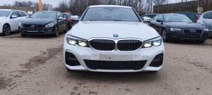 White BMW 320 2021 in Kaunas, with an engine capacity of 2.00 L and mileage of 99 thousand km for 29282 €, photo 3 on AUTOMOTO.COM.LV