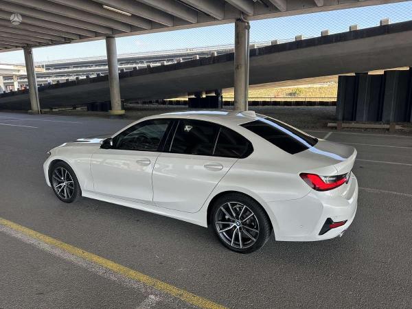 White BMW 320 2021 in Kaunas, with an engine capacity of 2.00 L and mileage of 42 thousand km for 25550 €, photo 5 on AUTOMOTO.COM.LV