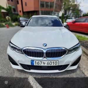 White BMW 320 2021 in Kaunas, with an engine capacity of 2.00 L and mileage of 143 thousand km for 22600 €, photo 1 on AUTOMOTO.COM.LV