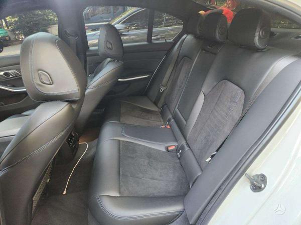 White BMW 320 2022 in Kaunas, with an engine capacity of 2.00 L and mileage of 140 thousand km for 21700 €, photo 8 on AUTOMOTO.COM.LV
