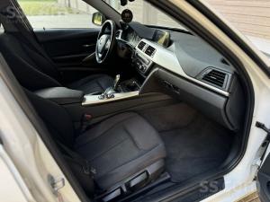 White BMW 320 2013 in Jelgava, with an engine capacity of 2.00 L and mileage of 284 thousand km for 8999 €, photo 14 on AUTOMOTO.COM.LV