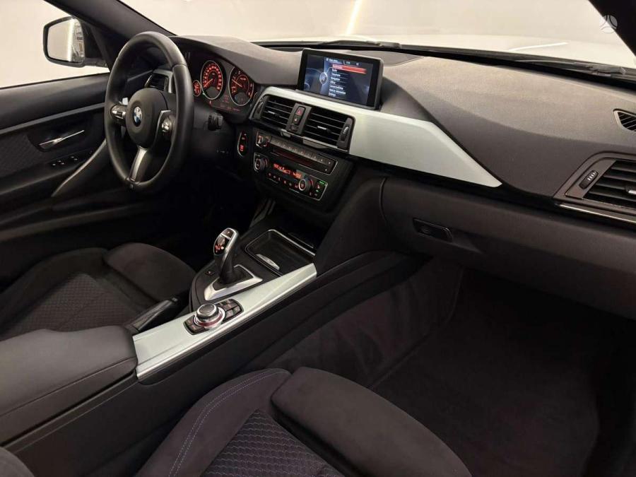 White BMW 320 2013 in Marijampole, with an engine capacity of 2.00 L and mileage of 238 thousand km for 10750 €, photo 13 on AUTOMOTO.COM.LV
