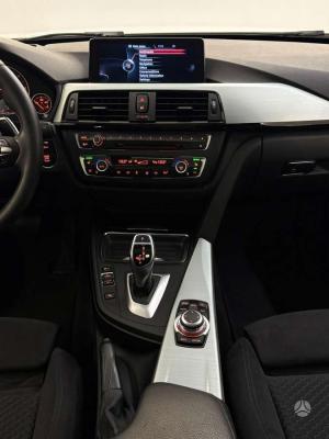 White BMW 320 2013 in Marijampole, with an engine capacity of 2.00 L and mileage of 238 thousand km for 10750 €, photo 15 on AUTOMOTO.COM.LV