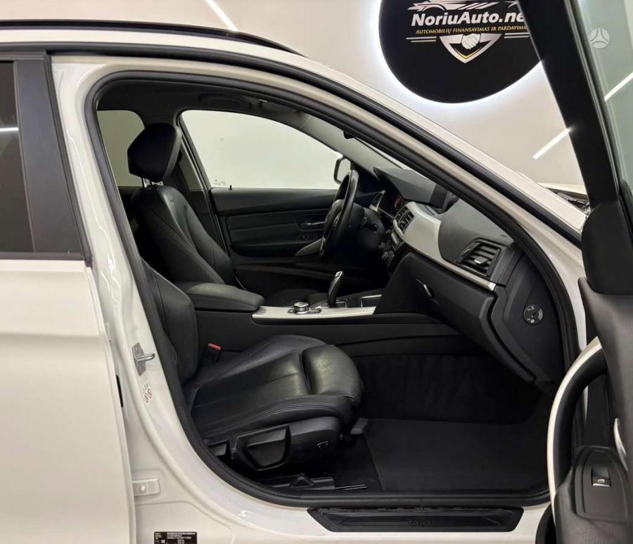 White BMW 320 2018 in Marijampole, with an engine capacity of 2.00 L and mileage of 208 thousand km for 12850 €, photo 12 on AUTOMOTO.COM.LV