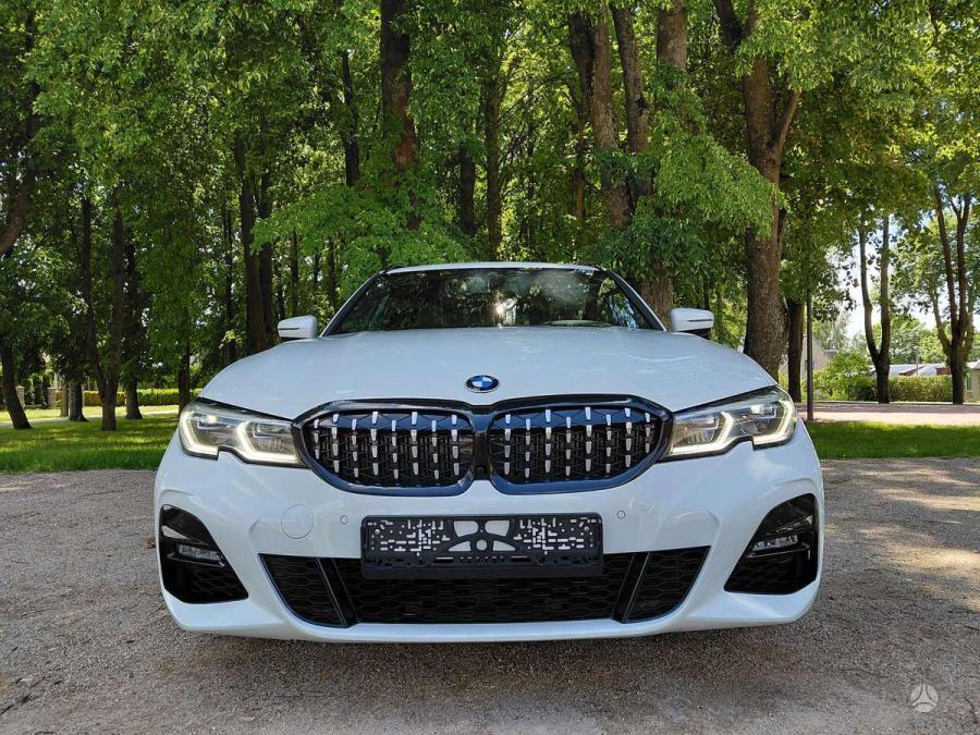 White BMW 320 2019 in Vilkaviskis, with an engine capacity of 2.00 L and mileage of 182 thousand km for 18300 €, photo 18 on AUTOMOTO.COM.LV