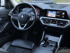 White BMW 320 2020 in Riga, with an engine capacity of 2.00 L and mileage of 184 thousand km for 17480 €, photo 12 on AUTOMOTO.COM.LV