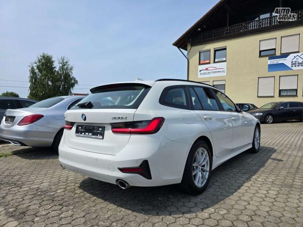 White BMW 320 2021 in Kaunas, with an engine capacity of 2.00 L and mileage of 99 thousand km for 25995 €, photo 6 on AUTOMOTO.COM.LV