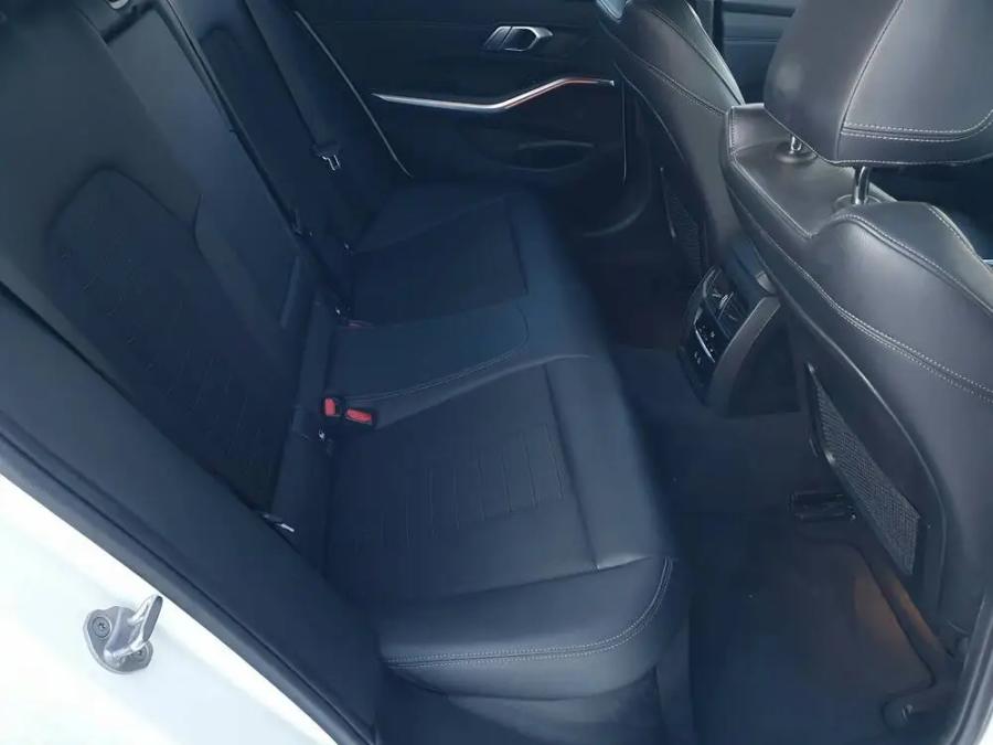 White BMW 320 2021 in Jelgava, with an engine capacity of 2.00 L and mileage of 228 thousand km for 17000 €, photo 12 on AUTOMOTO.COM.LV