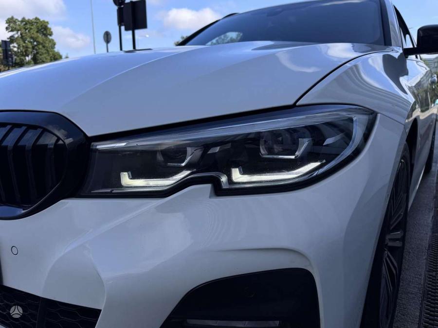 White BMW 320 2021 in Vilnius, with an engine capacity of 2.00 L and mileage of 239 thousand km for 20700 €, photo 11 on AUTOMOTO.COM.LV