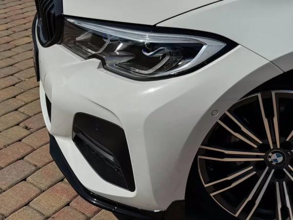 White BMW 320 2022 in Riga, with an engine capacity of 2.00 L and mileage of 169 thousand km for 22000 €, photo 8 on AUTOMOTO.COM.LV