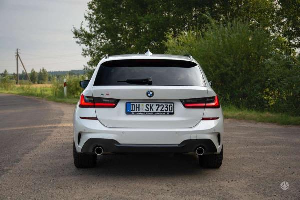 White BMW 320 2022 in Elektrenai, with an engine capacity of 2.00 L and mileage of 194 thousand km for 20450 €, photo 6 on AUTOMOTO.COM.LV