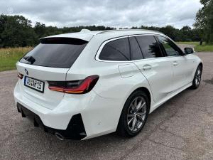 White BMW 320 2023 in Kaunas, with an engine capacity of 2.00 L and mileage of 40 thousand km for 33100 €, photo 6 on AUTOMOTO.COM.LV