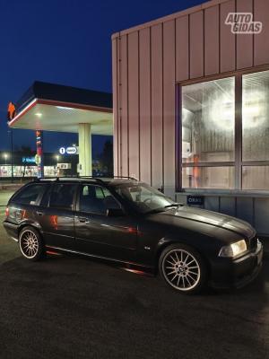 Black BMW 323 1996 in Alytus, with an engine capacity of 2.50 L and mileage of 386 thousand km for 3250 €, photo  on AUTOMOTO.COM.LV