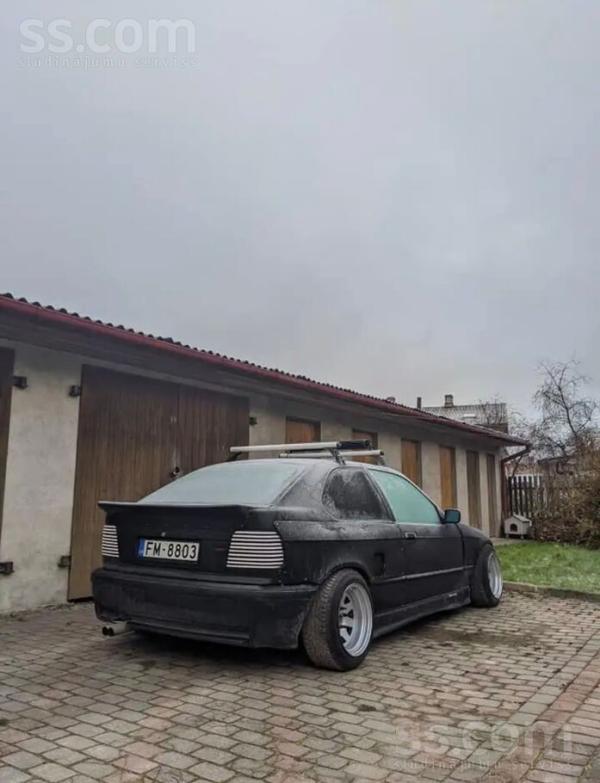 Black BMW 325 1995 in Liepaja, with an engine capacity of 2.50 L and mileage of 311 thousand km for 3250 €, photo 1 on AUTOMOTO.COM.LV